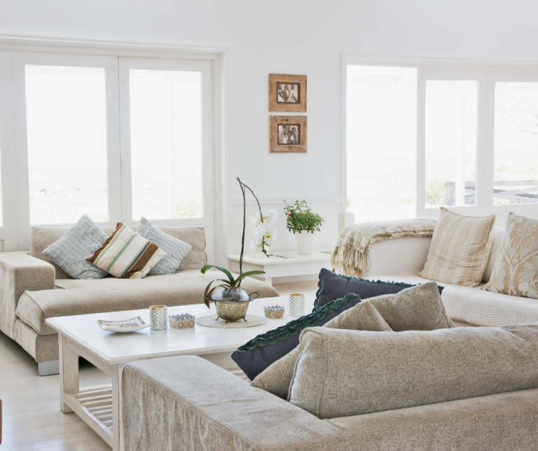 How to Decorate Wall Between Two Windows - swankyden.com